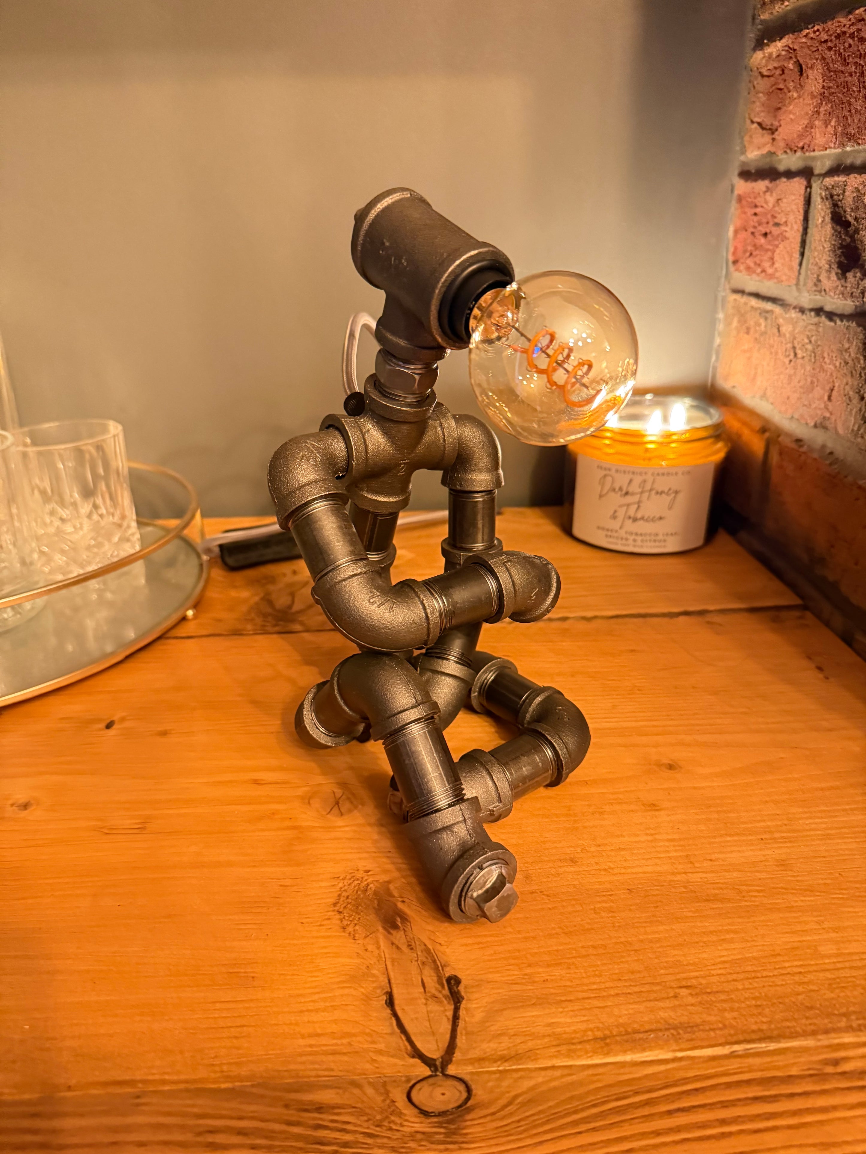 The Thinking Man Industrial Style Iron Pipe Person Lamp & Vintage Bulb ...
