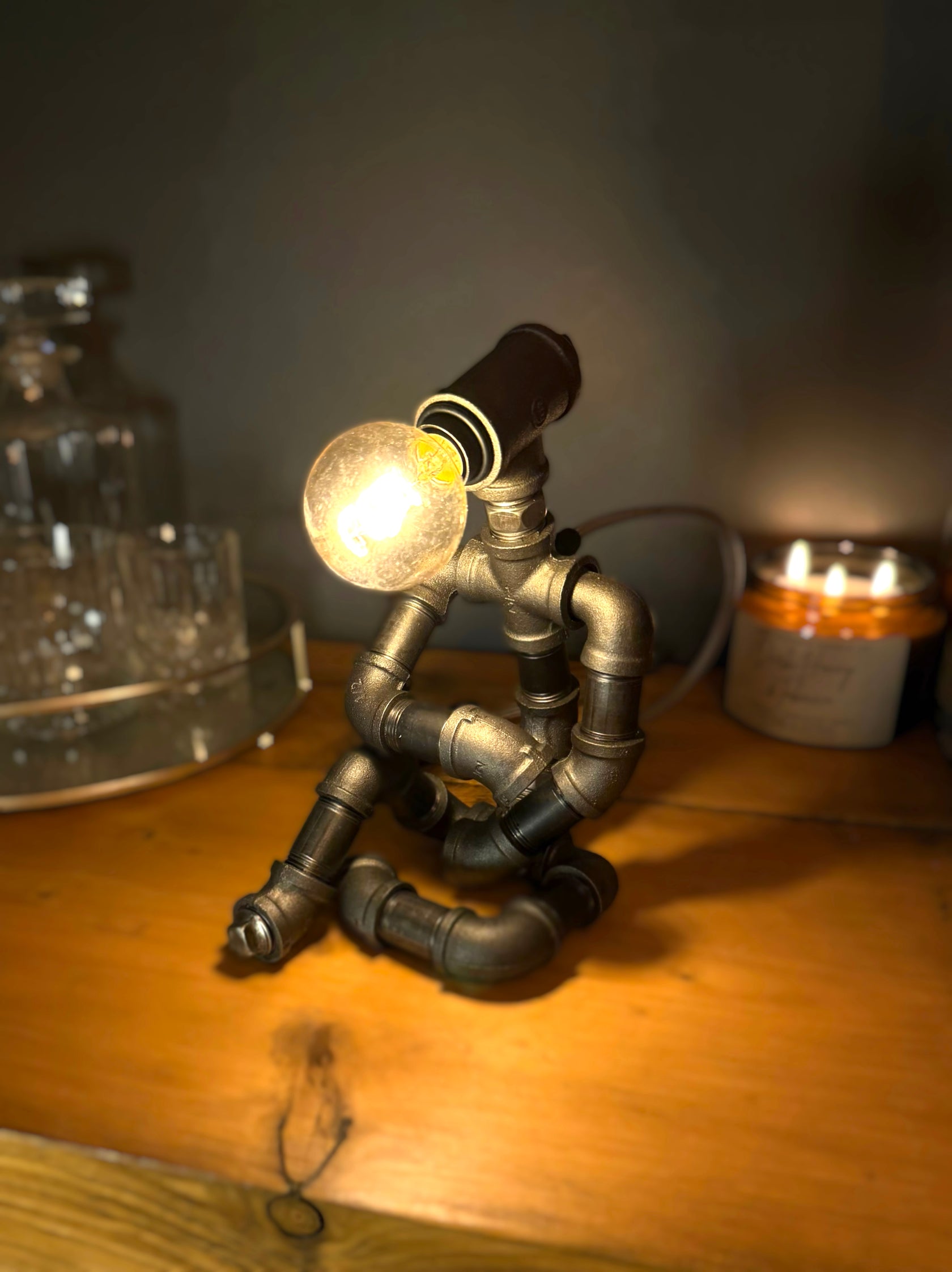 The Thinking Man Industrial Style Iron Pipe Person Lamp & Vintage Bulb ...