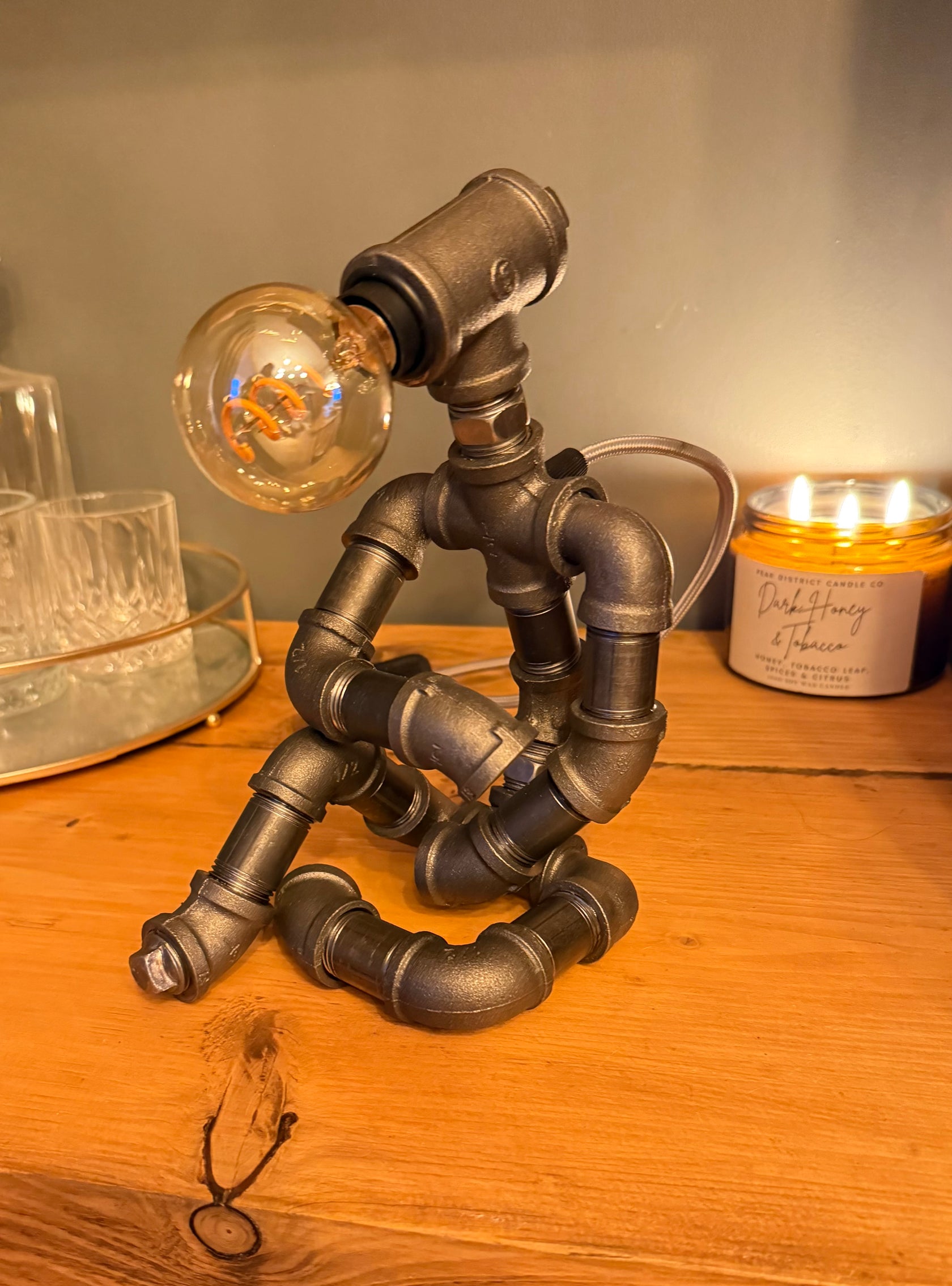The Thinking Man Industrial Style Iron Pipe Person Lamp & Vintage Bulb ...