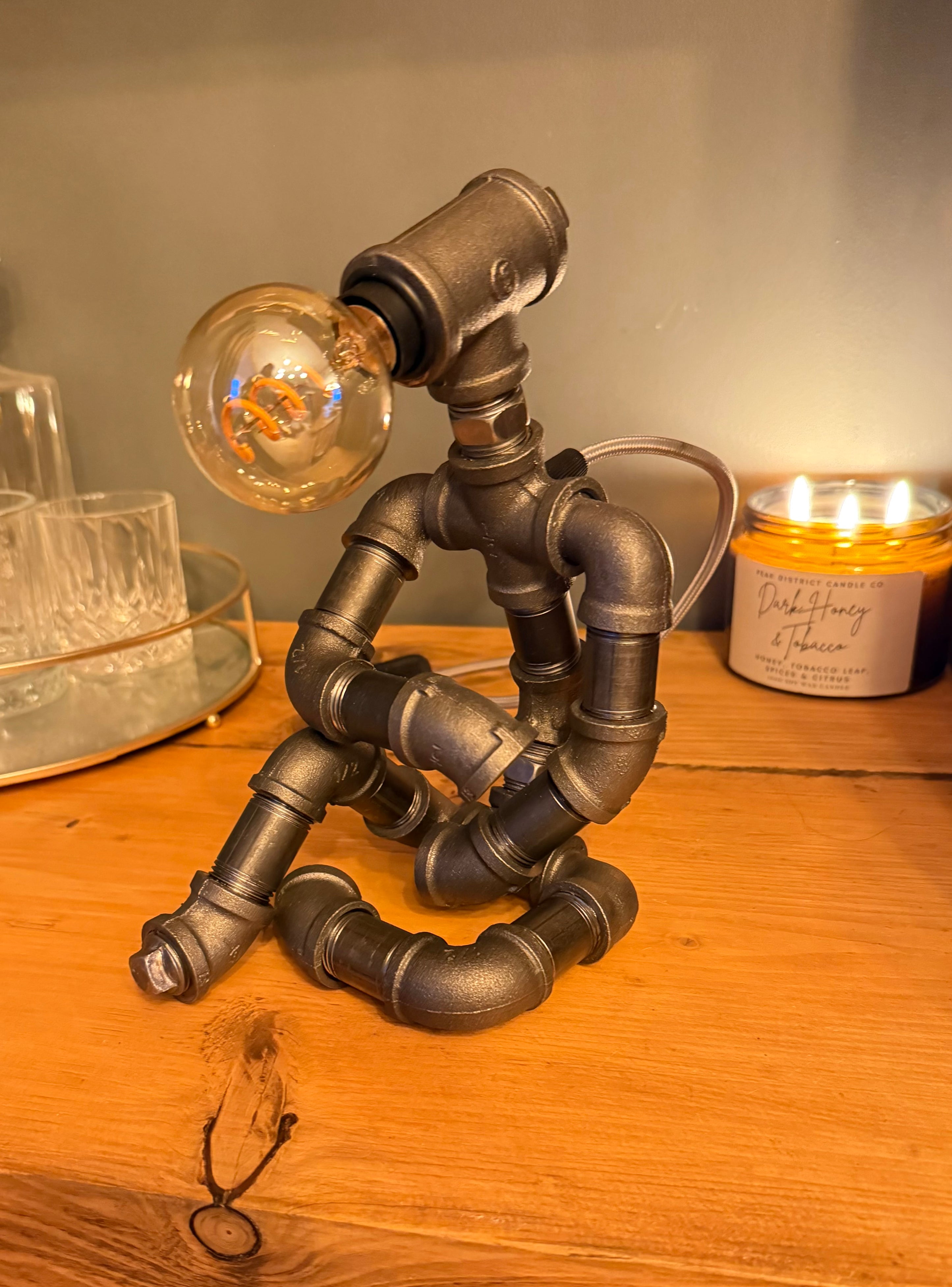 The Thinking Man Industrial Style Iron Pipe Person Lamp & Vintage Bulb ...