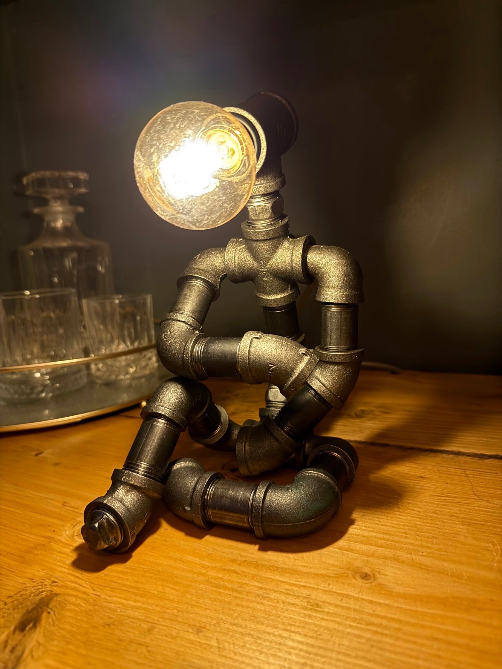 The Thinking Man Industrial Style Iron Pipe Person Lamp & Vintage Bulb ...