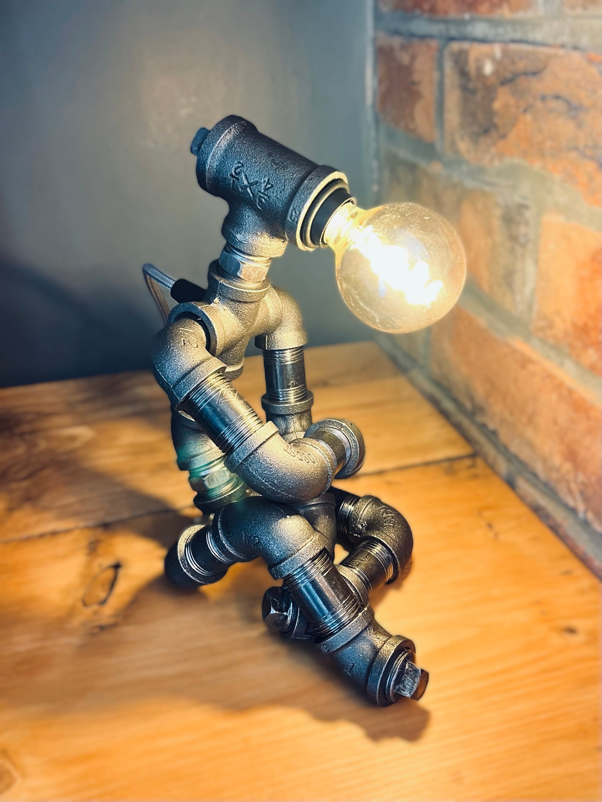 The Thinking Man Industrial Style Iron Pipe Person Lamp & Vintage Bulb ...