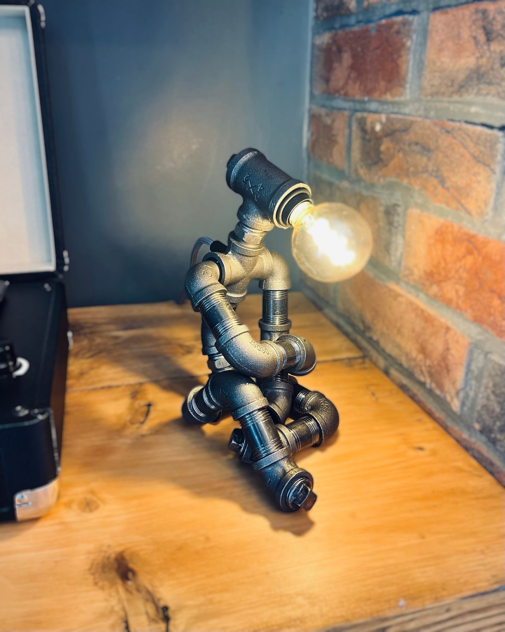 The Thinking Man Industrial Style Iron Pipe Person Lamp & Vintage Bulb ...