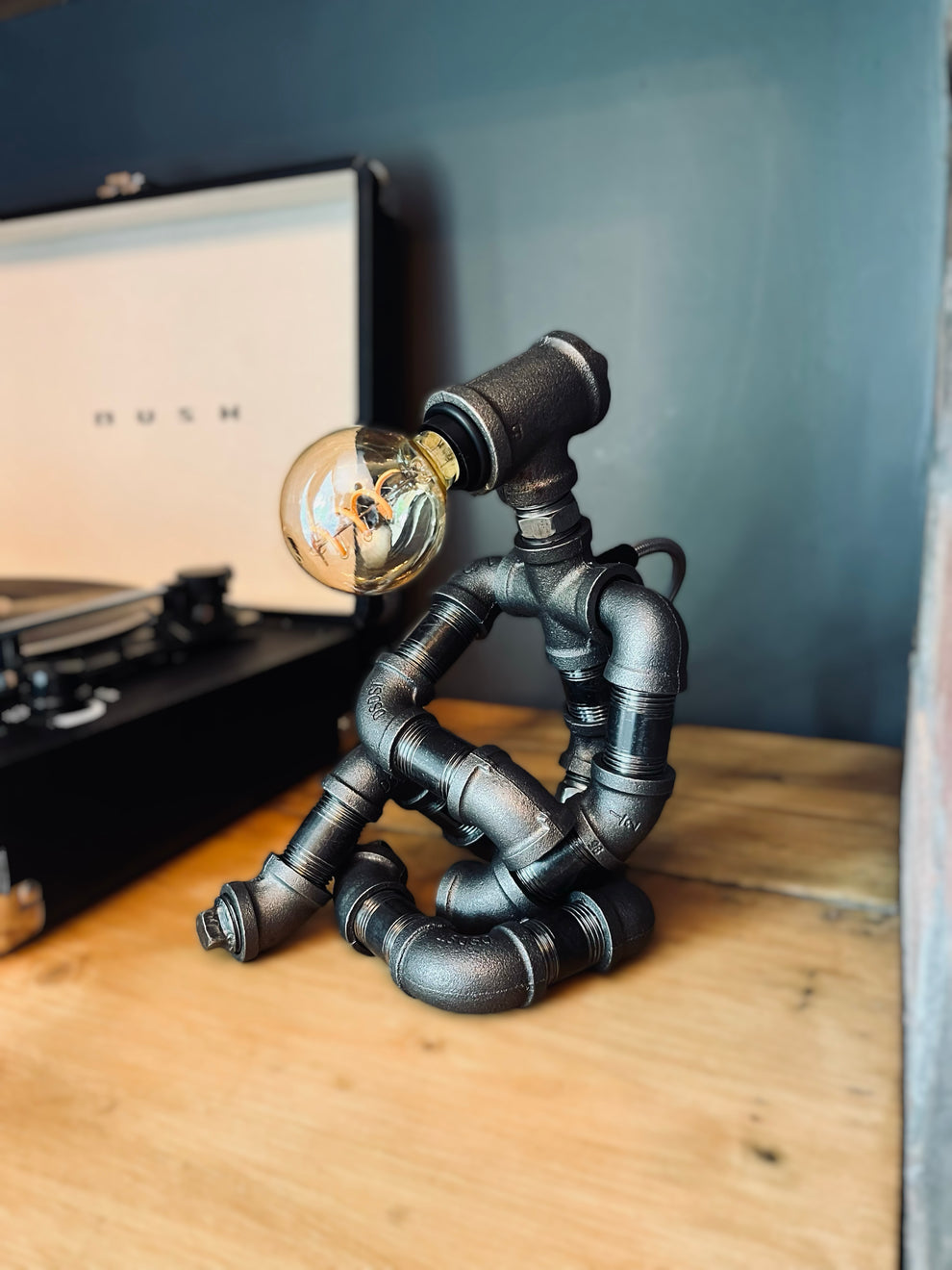 The Thinking Man Industrial Style Iron Pipe Person Lamp & Vintage Bulb ...