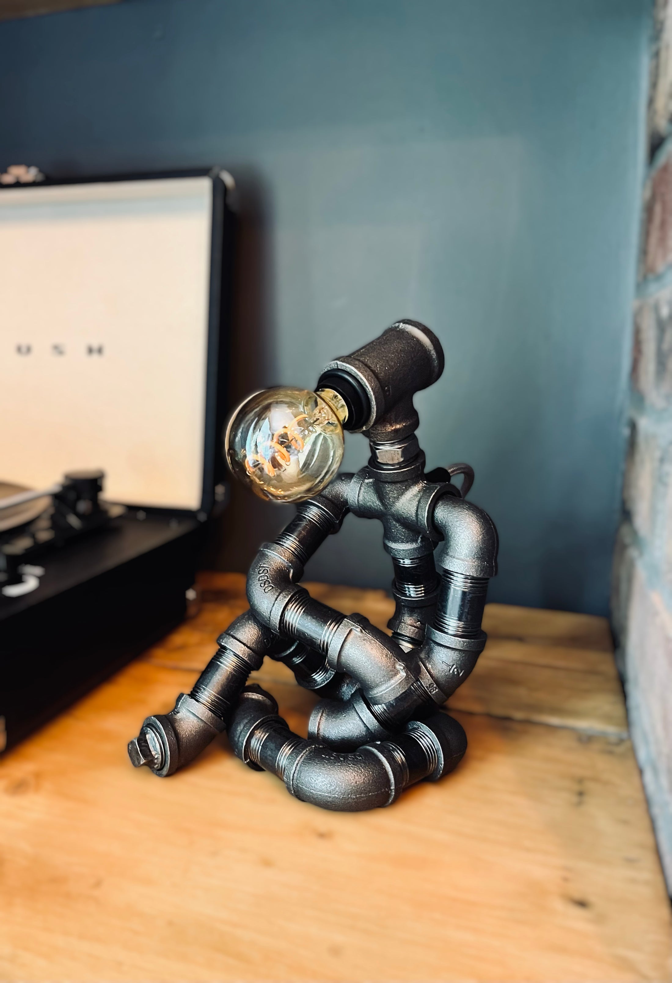 The Thinking Man Industrial Style Iron Pipe Person Lamp & Vintage Bulb ...