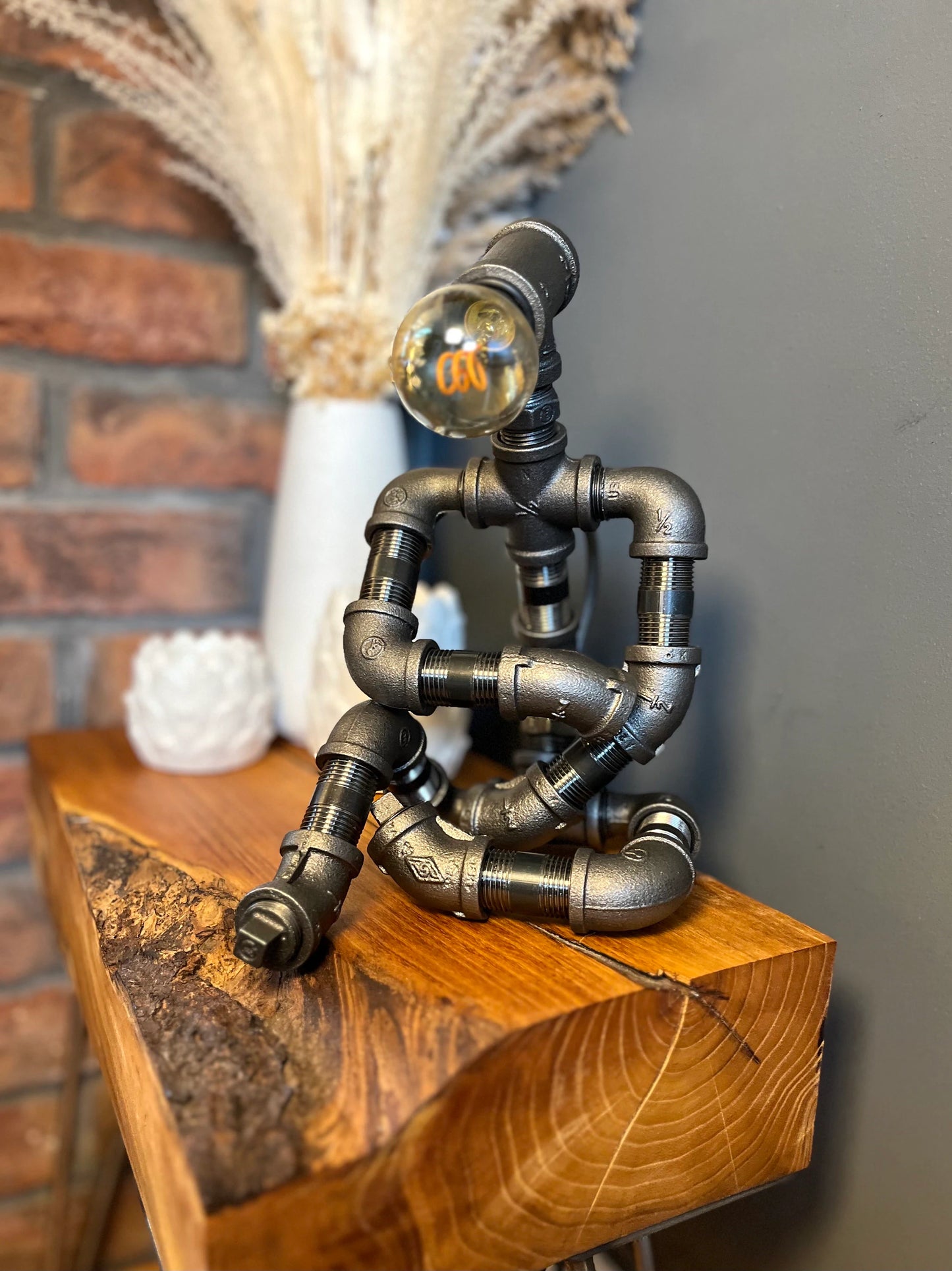 The Thinking Man Industrial Style Iron Pipe Person Lamp & Vintage Bulb ...