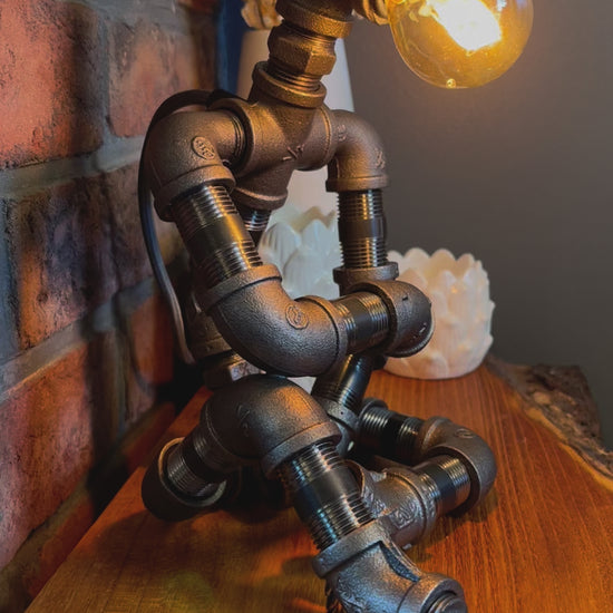 The Thinking Man Industrial Style Iron Pipe Person Lamp & Vintage Bulb ...