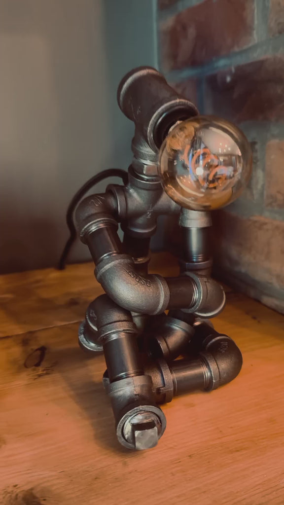 The Thinking Man Industrial Style Iron Pipe Person Lamp & Vintage Bulb ...