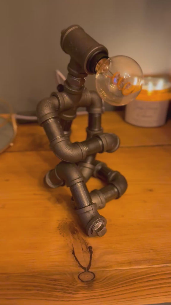The Thinking Man Industrial Style Iron Pipe Person Lamp & Vintage Bulb ...